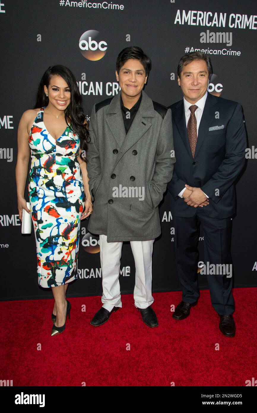 From left, Gleendilys Inoa, Johnny Ortiz and Benito Martinez attend the ...
