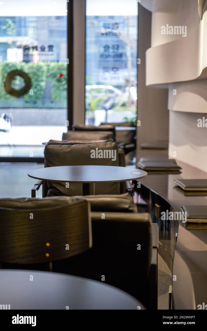 A modern decoration style coffee shop seating environment Stock Photo ...