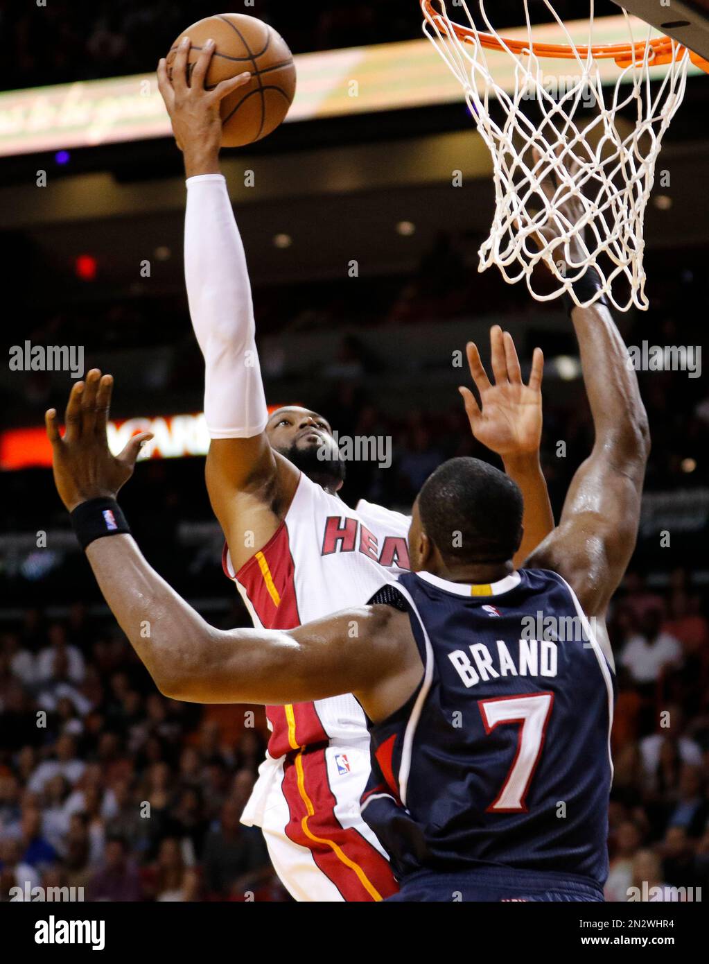 Miami Heat guard Dwyane Wade (3) shoots over Atlanta Hawks forward ...