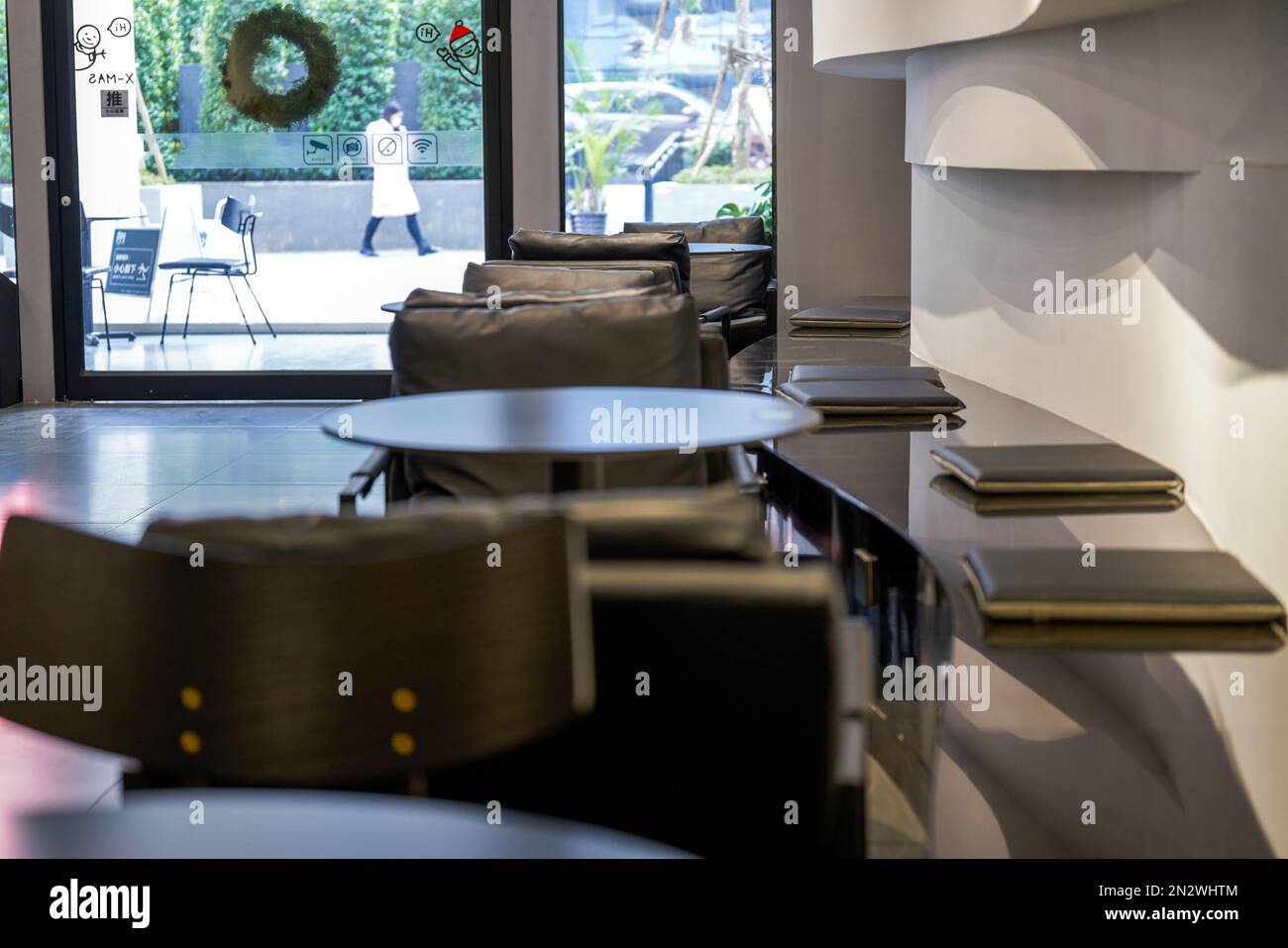 A modern decoration style coffee shop seating environment Stock Photo ...