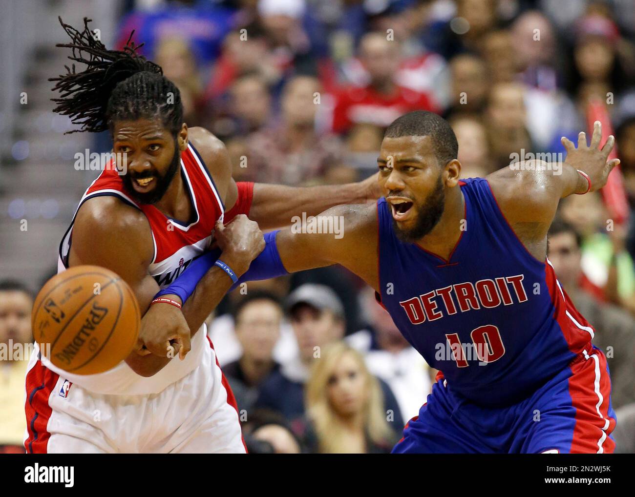 Washington Wizards forward Nene (42), from Brazil, and Detroit Pistons ...