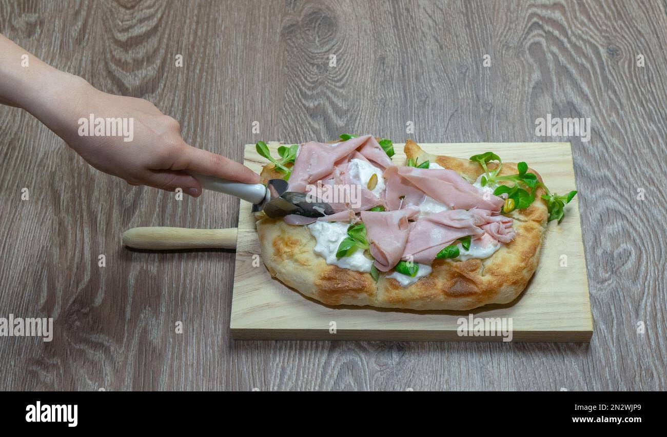 Roman pinsa, variant of the classic Italian pizza topped with ...