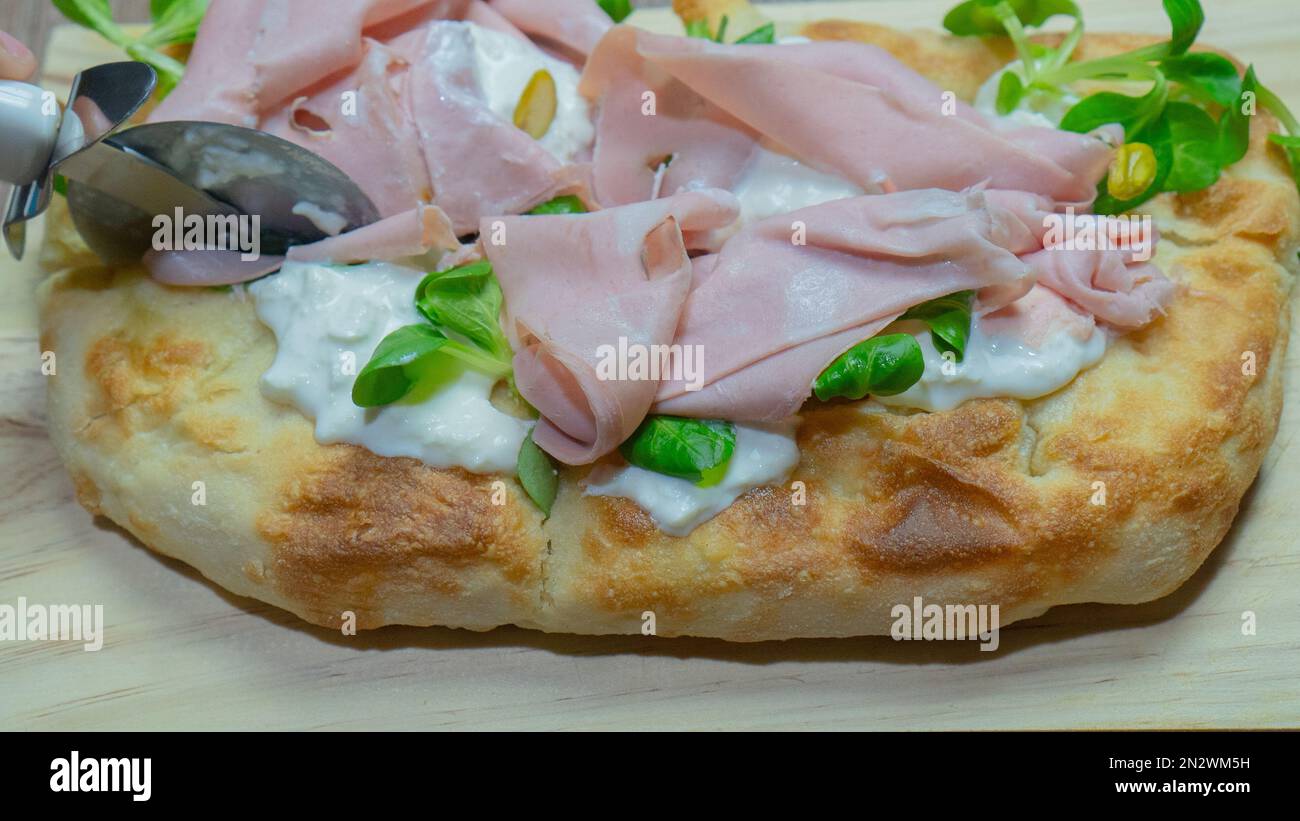 Roman pinsa, variant of the classic Italian pizza topped with ...