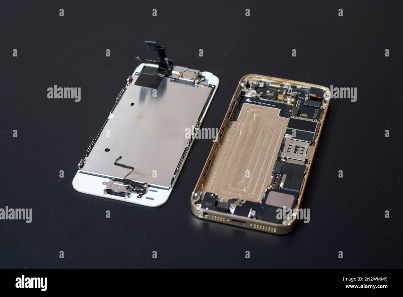 The internals and components of a disassembled smartphone Stock Photo ...