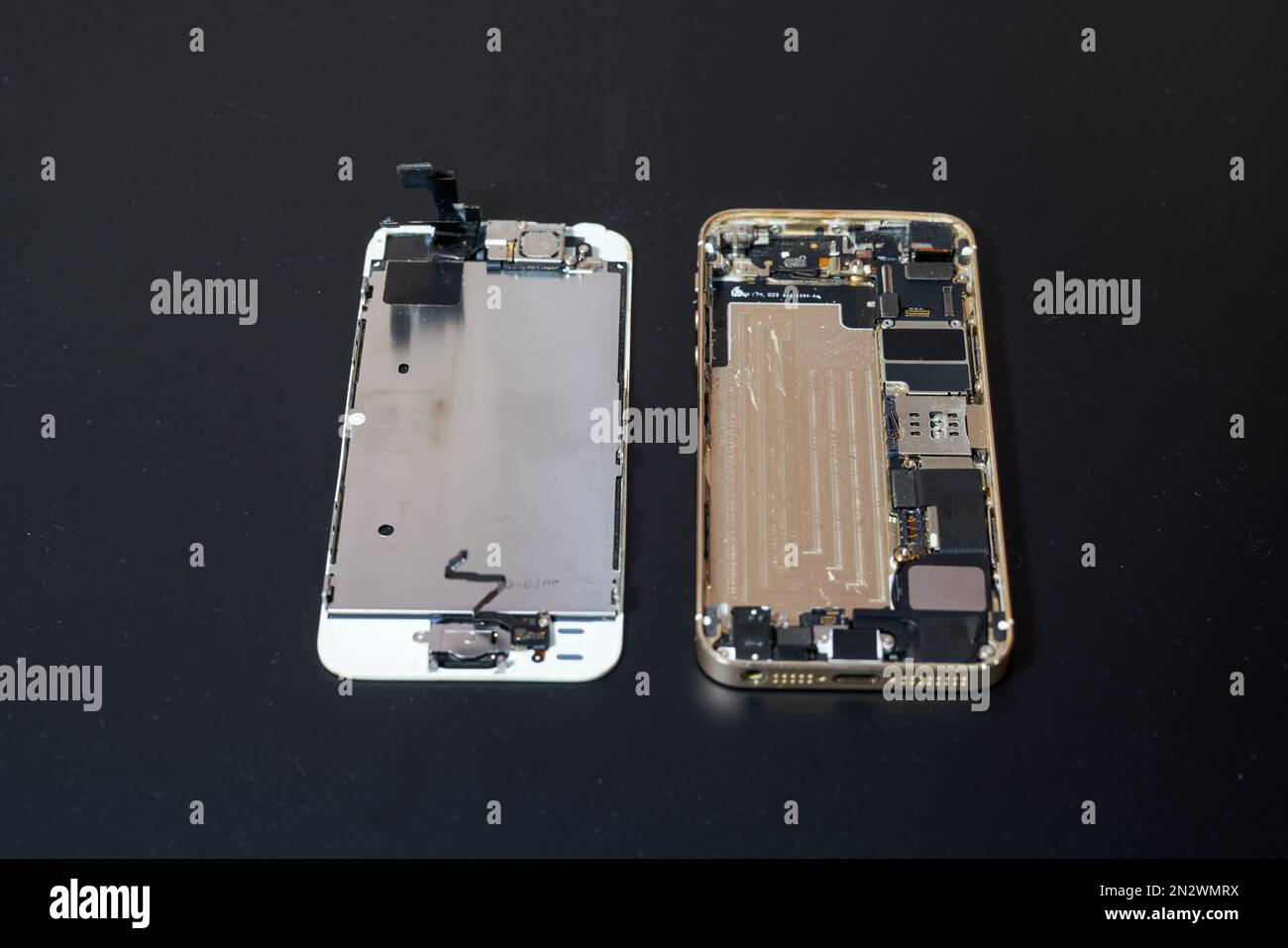 The internals and components of a disassembled smartphone Stock Photo ...