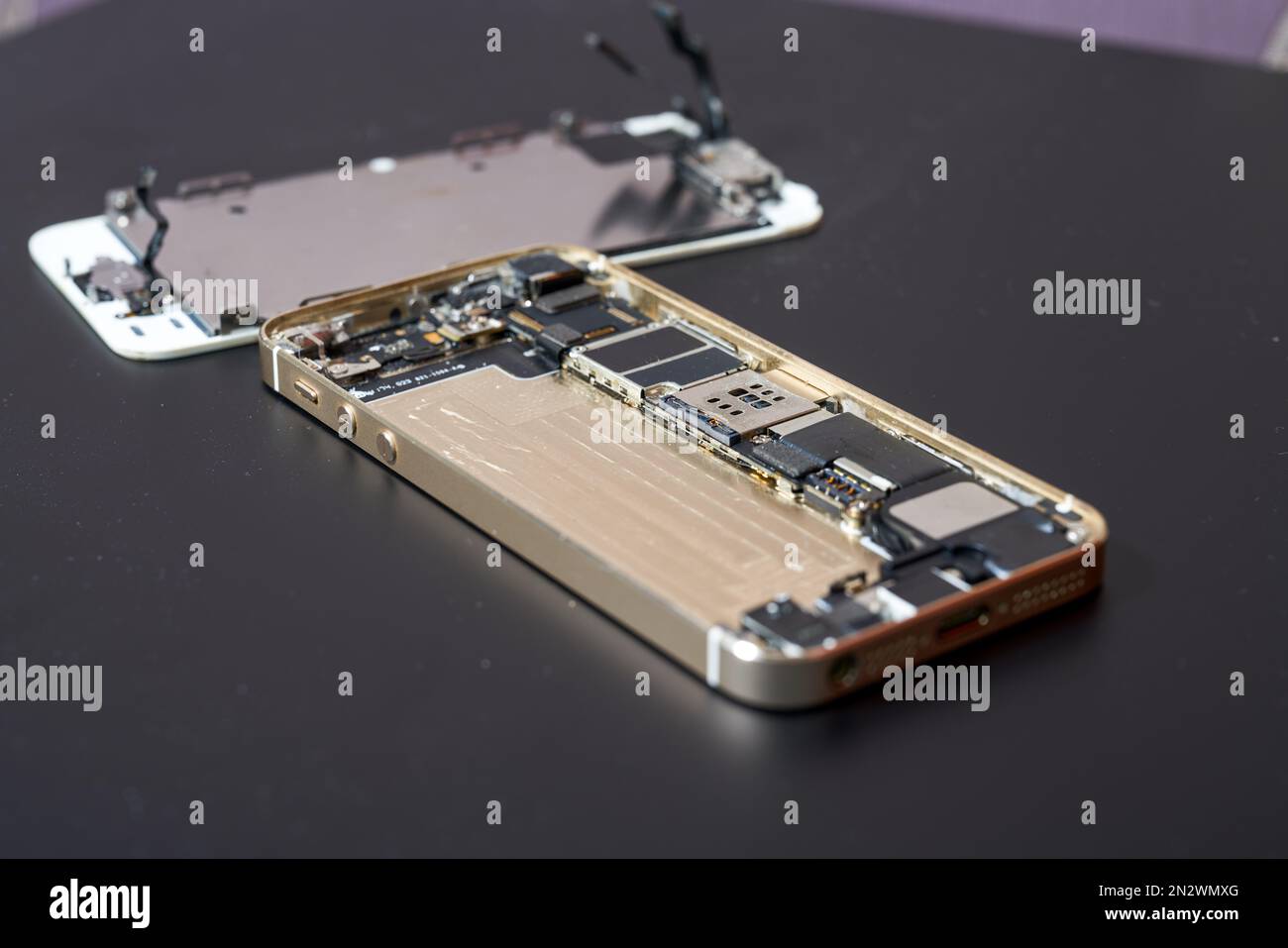 The internals and components of a disassembled smartphone Stock Photo ...