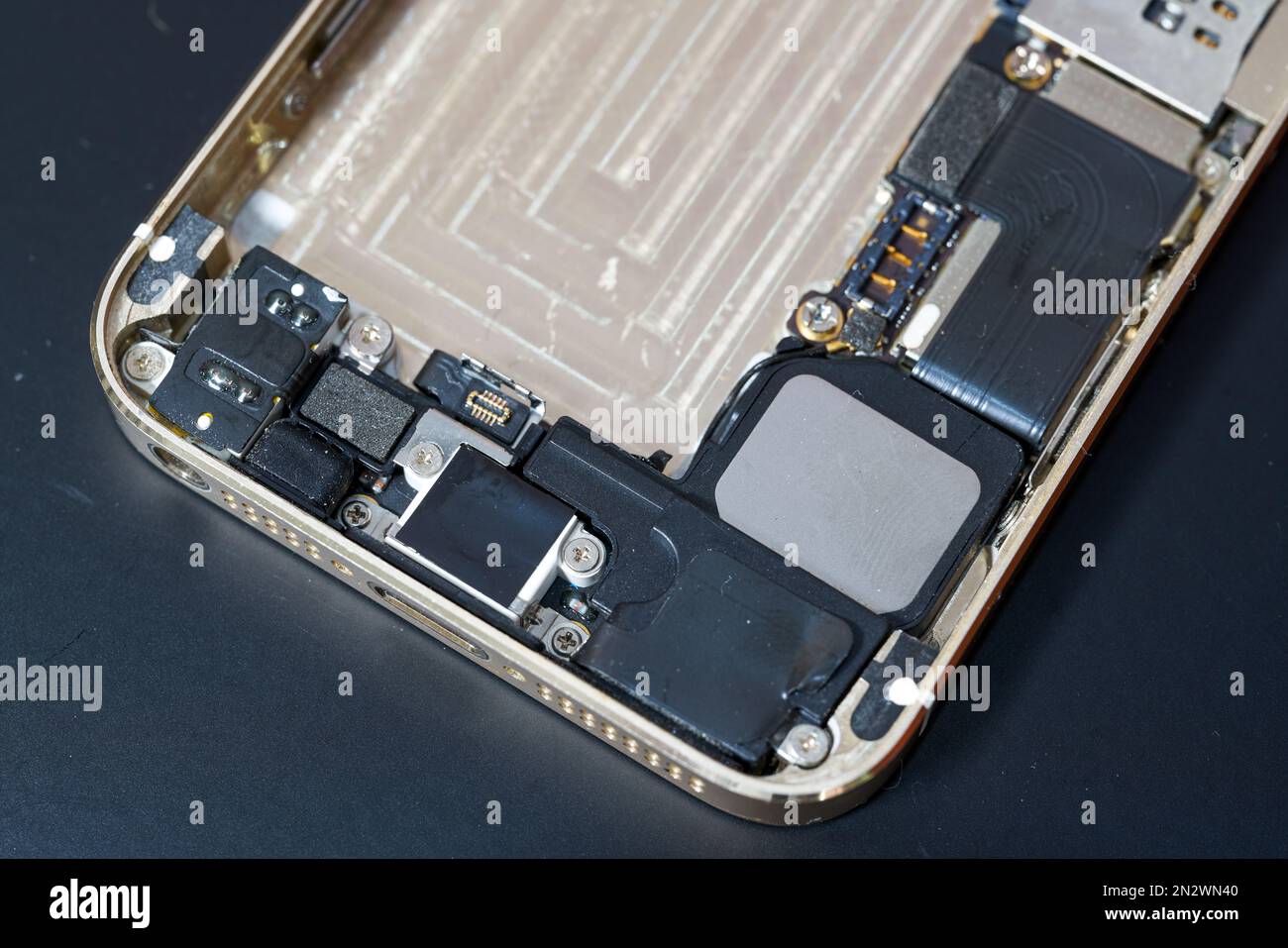 The internals and components of a disassembled smartphone Stock Photo ...