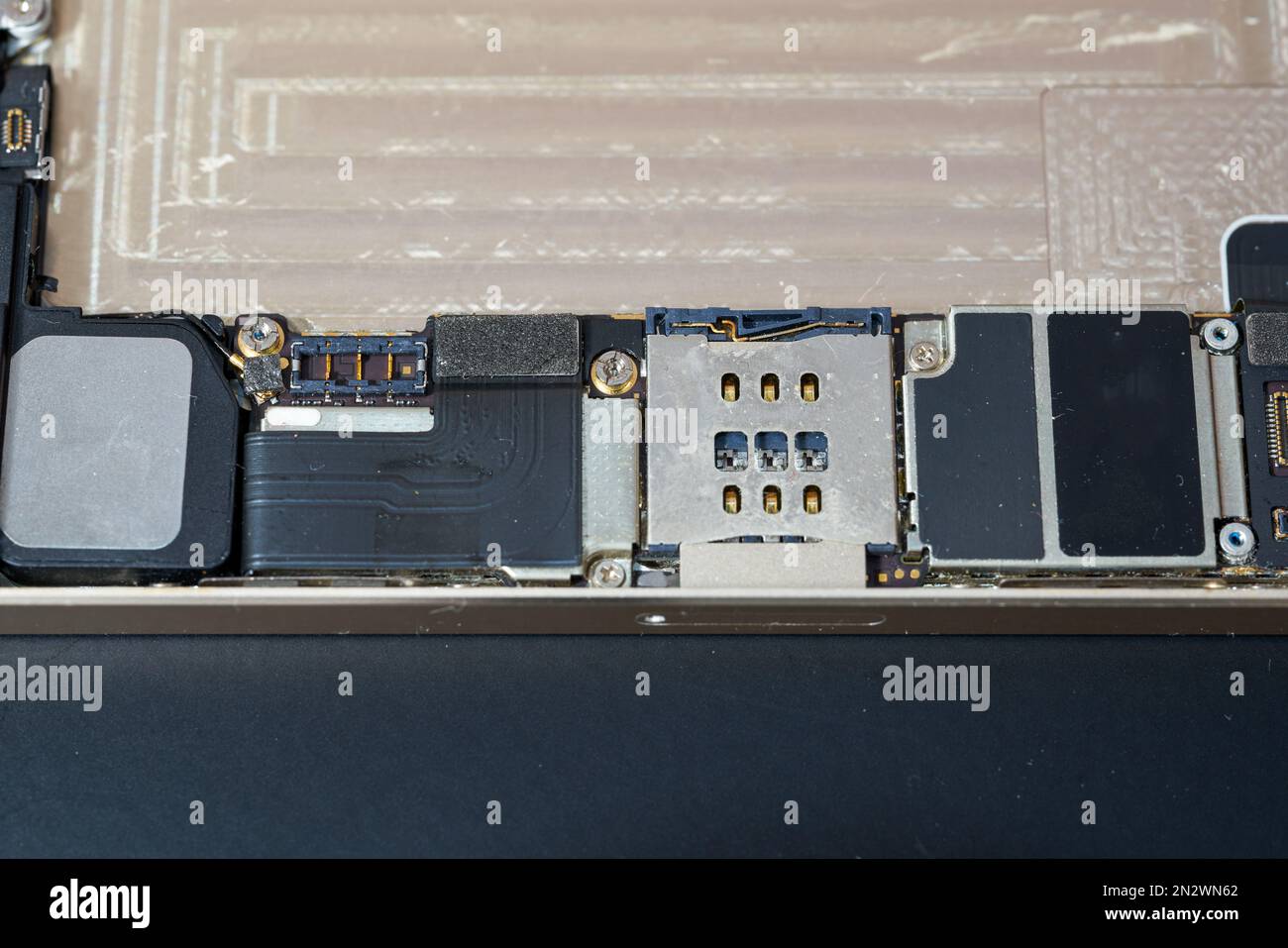 The internals and components of a disassembled smartphone Stock Photo ...