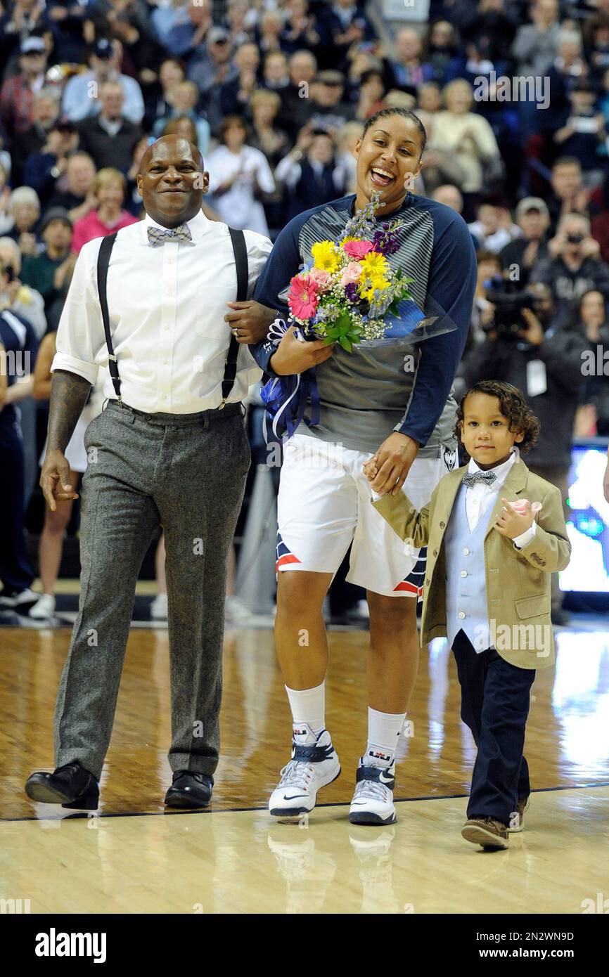 Connecticut's Kaleena Mosqueda-Lewis, center, celebrates senior day ...
