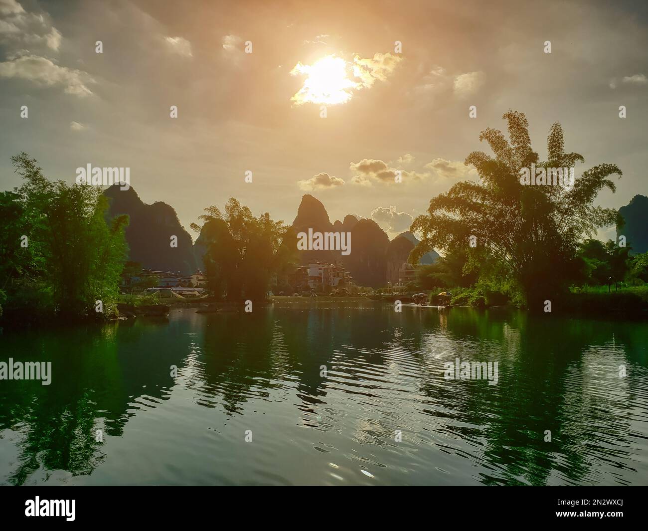 Sunset against yellow mountains in China Stock Photo - Alamy