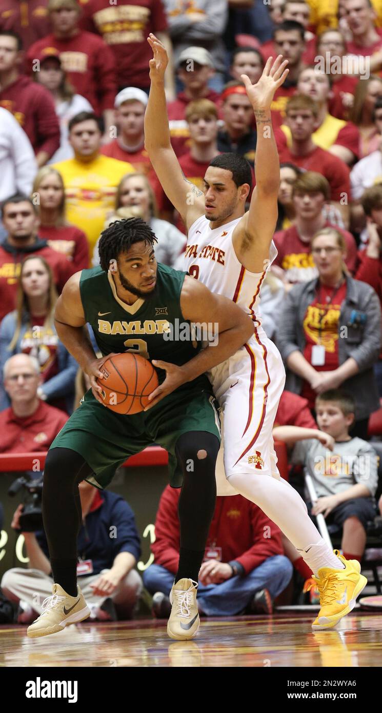 Baylor forward Rico Gathers tries to get around the defense of Iowa ...