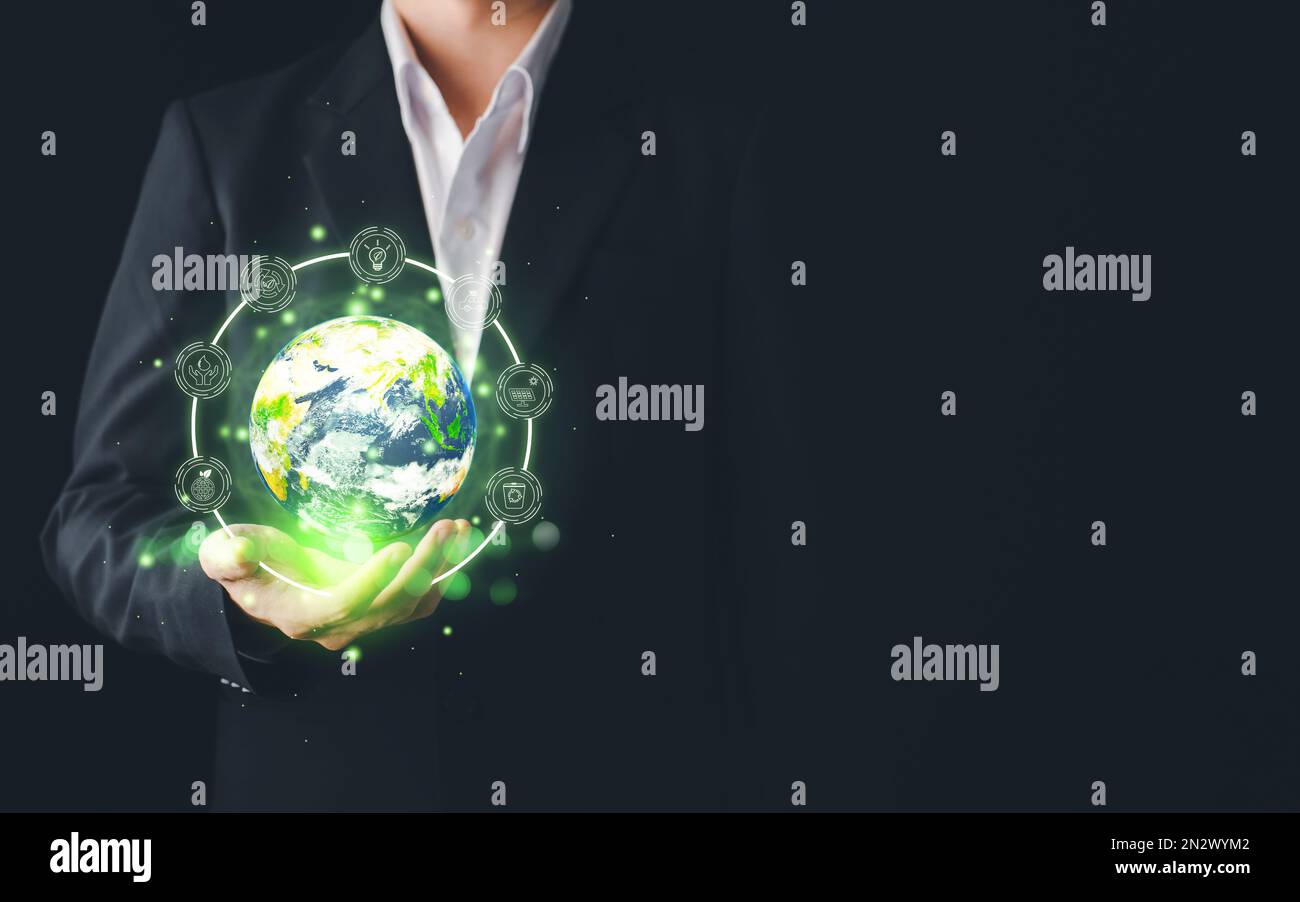 Businessman hand hold globe. ESG, Environment Social Governance. Net ...