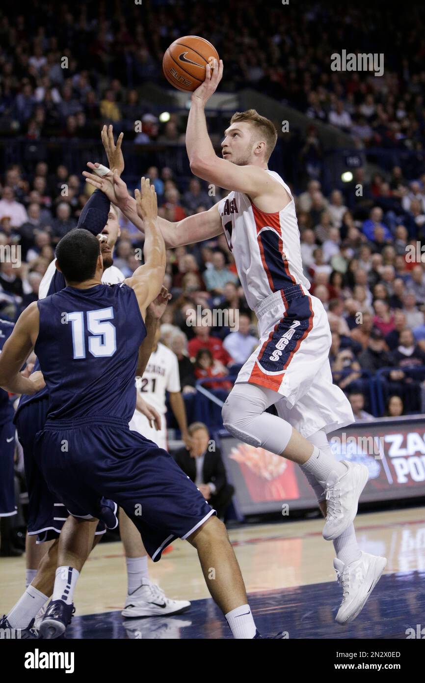 Gonzaga's Domantas Sabonis, right, shoots against San Diego's Thomas Jacobs (15) and Jito Kok ...