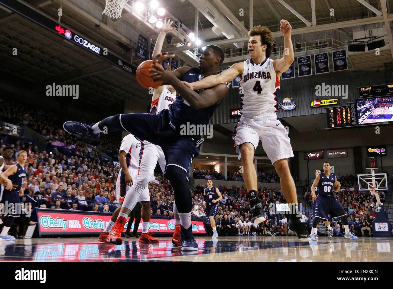 Gonzaga's Kevin Pangos (4), right, and San Diego's Brandon Perry go ...