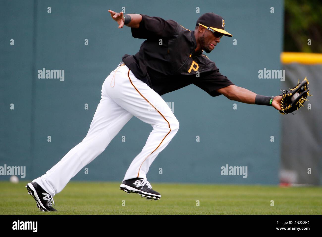 Pittsburgh Pirates left fielder Starling Marte makes a catch during a ...