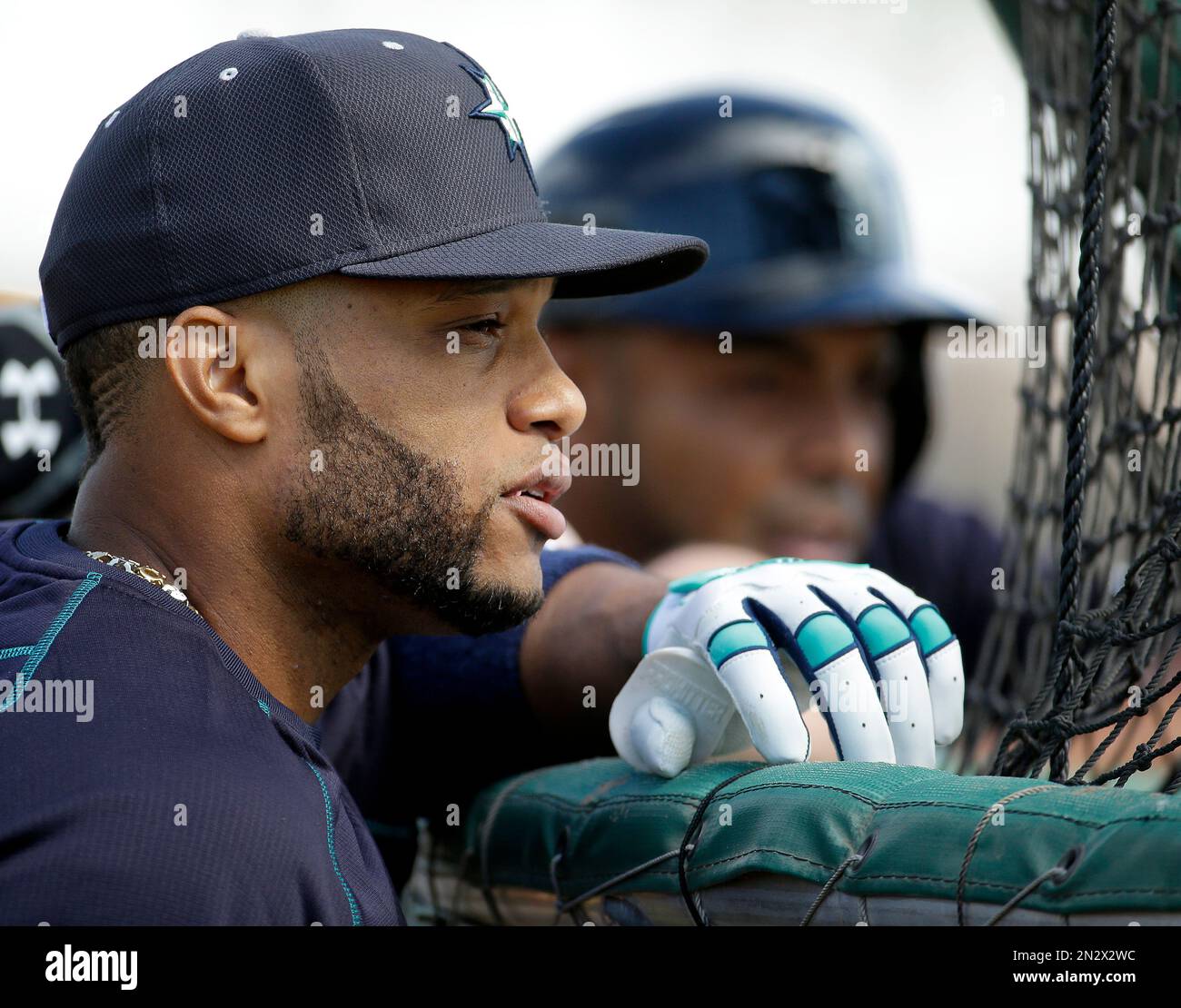 Seattle Mariners' Robinson Cano watches batting practice during spring ...