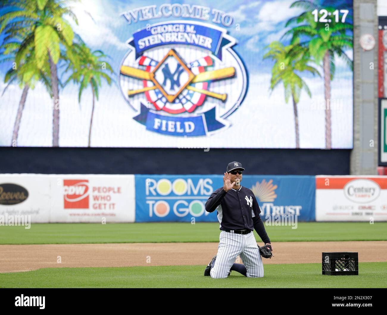 New York Yankees' Alex Rodriguez waves as he does fielding drills at ...