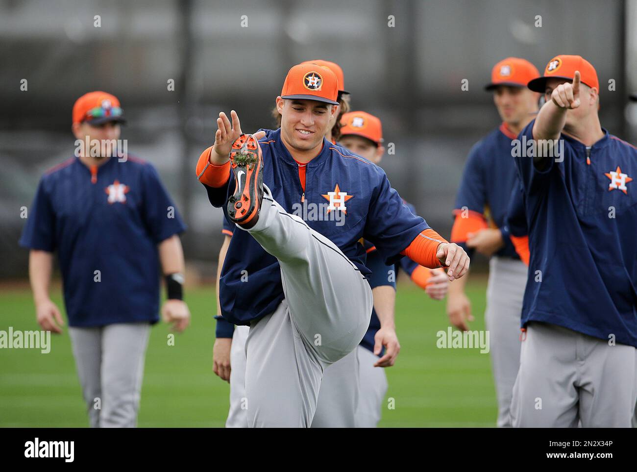 Houston Astros' George Springer stretches with teammates during a ...