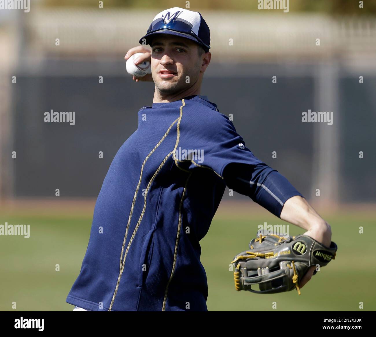 Milwaukee Brewers’ Ryan Braun throws during a spring training baseball ...