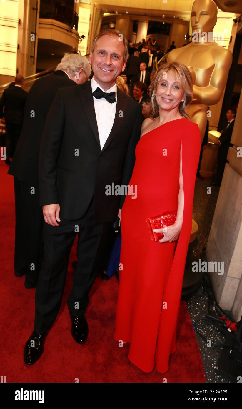 Gary Jones, left, and Stacey Snider arrive at the Oscars on Sunday, Feb. 22, 2015, at the Dolby ...