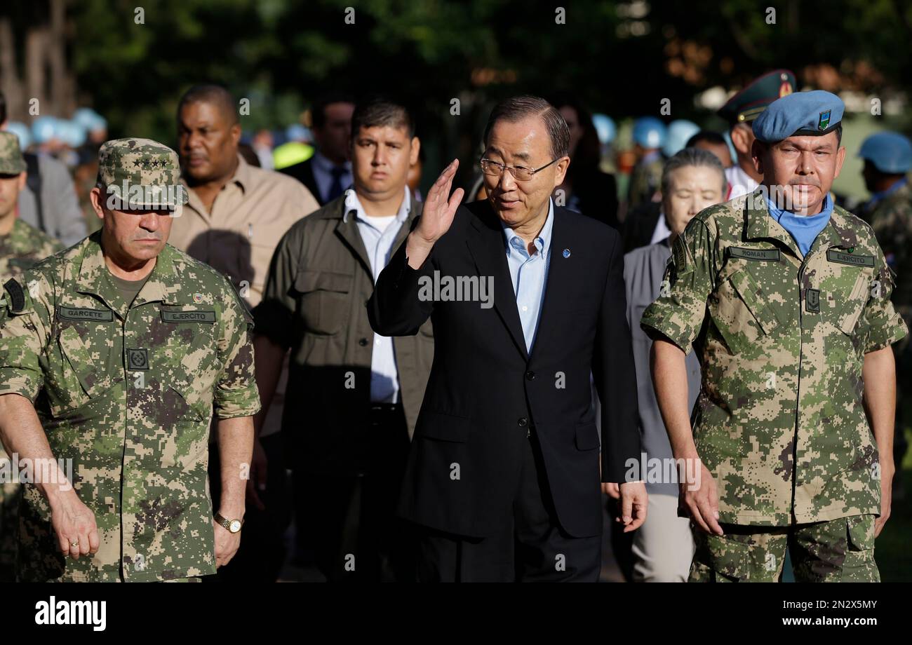 United Nations Secretary-General Ban Ki-Moon, center, waves as he ...