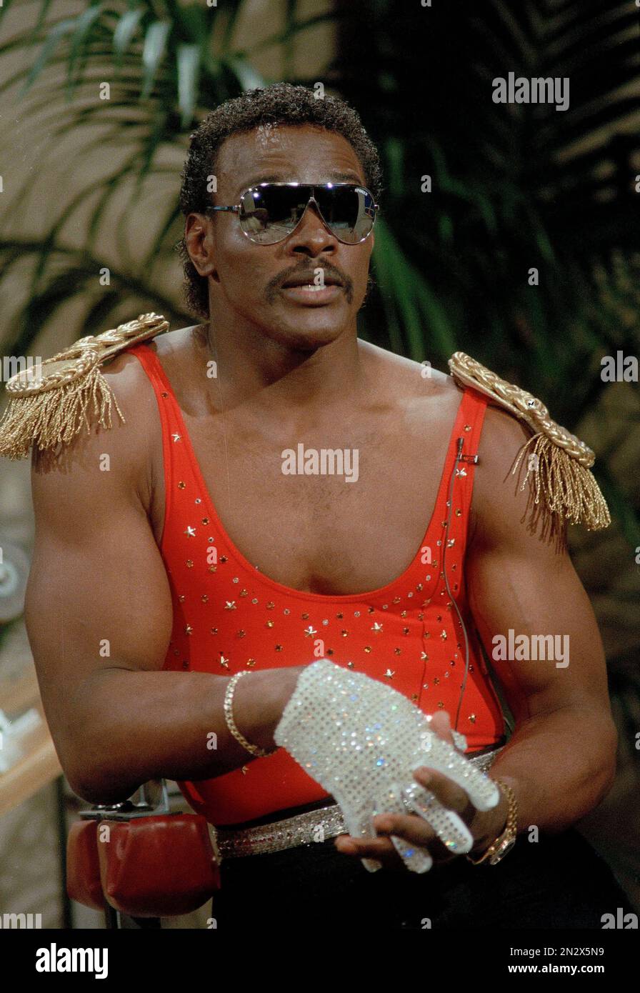 Chicago Bears star Walter Payton wears the trademark uniform of another star, Michael Jackson ...