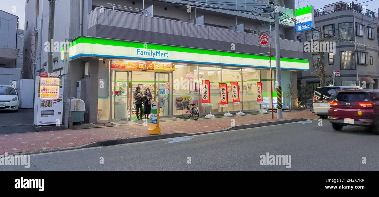 The storefront shot of a busy FamilyMart, a popular Japanese ...