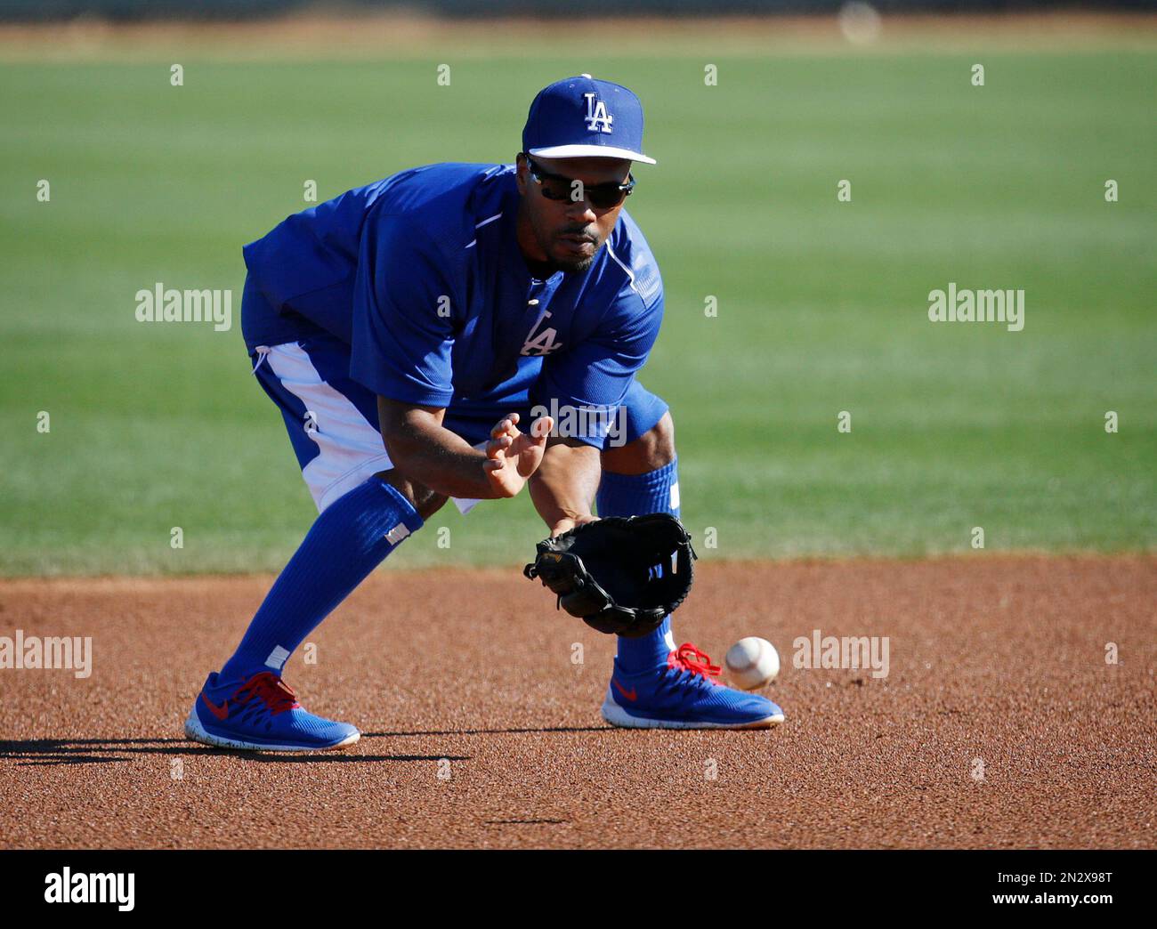 Los Angeles Dodgers' Jimmy Rollins participates in a drill during a ...