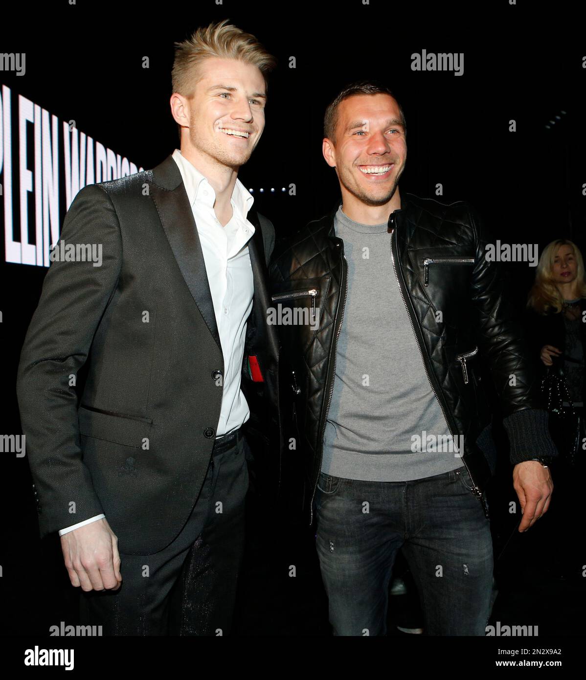 Inter Milan's Lukas Podolski, right, and Formula One German driver Nico ...