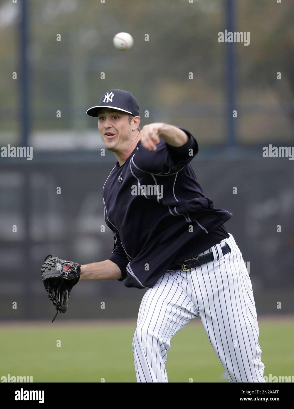 New York Yankees pitcher Andrew Miller throws during a spring training ...