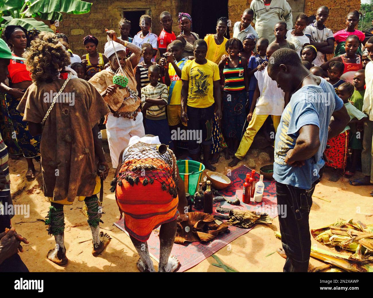 In this photo taken on Feb. 23, 2015, traditional healers, left, take ...
