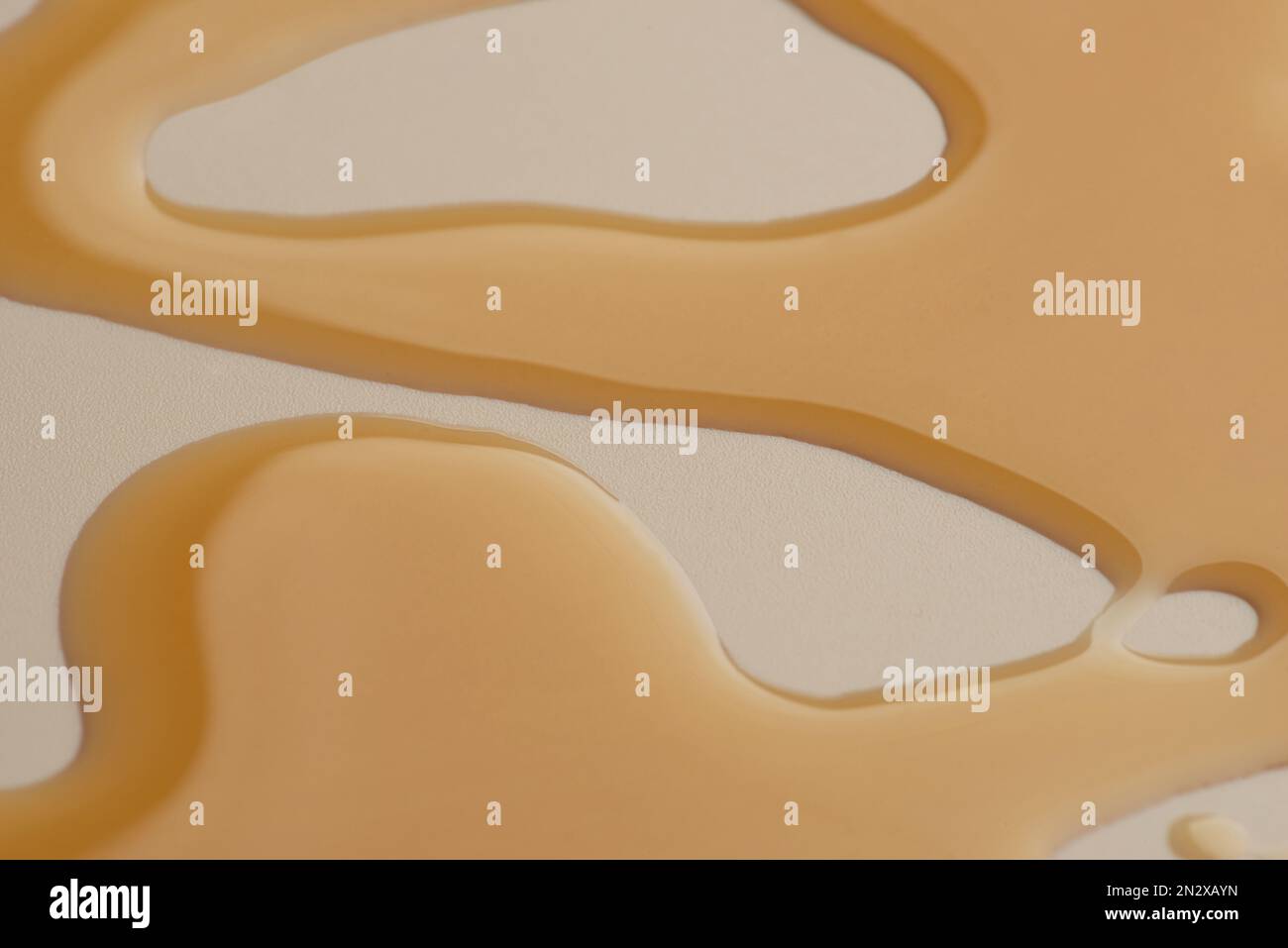 Oil texture on a beige background Stock Photo - Alamy