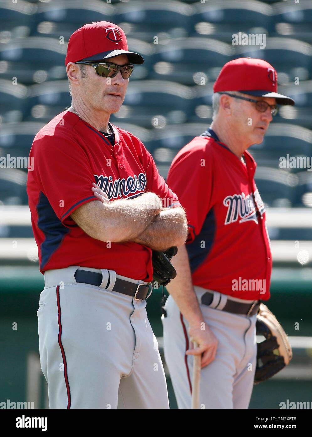Minnesota Twins manager Paul Molitor, left, and third base coach Gene ...