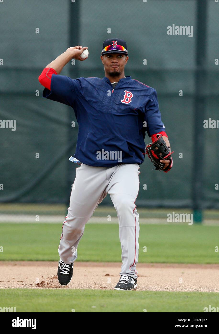 Boston Red Sox's Xander Bogaerts throws to first after fielding a ...