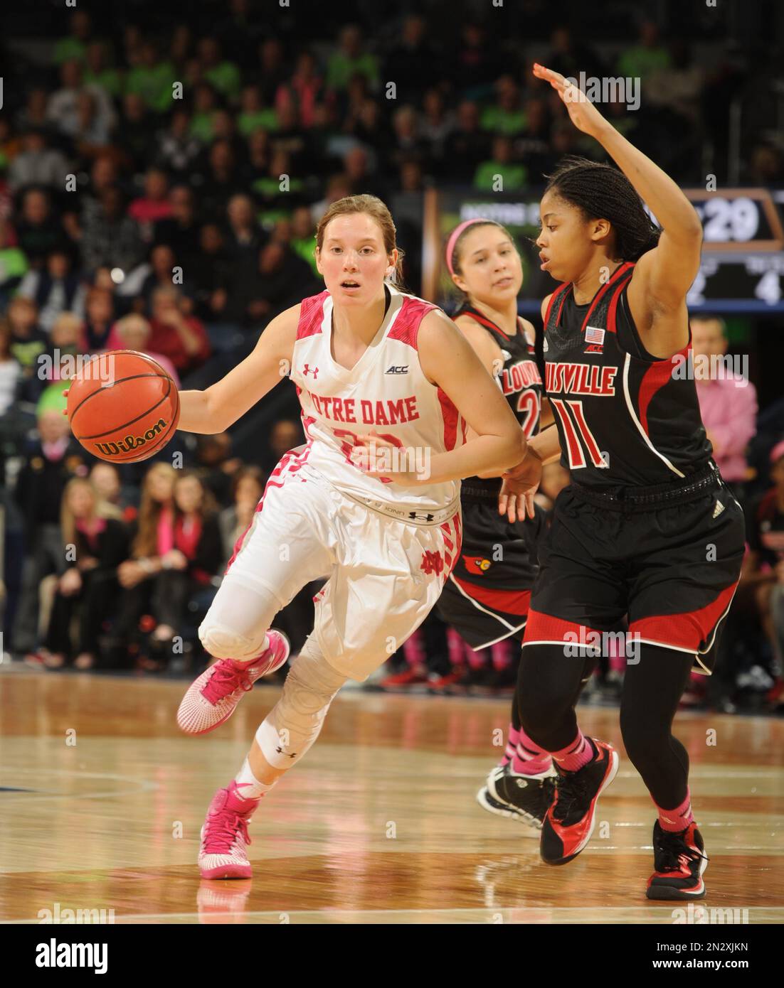 Notre Dame guard Madison Cable (22) drives the lane Louisville guard ...