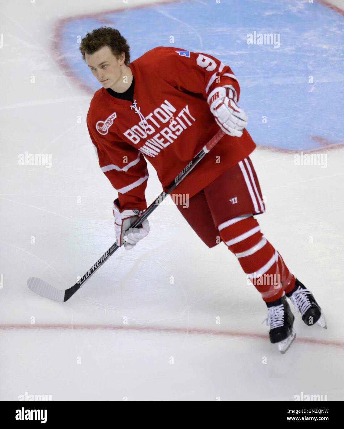 Boston University forward Jack Eichel warms up before the first period ...