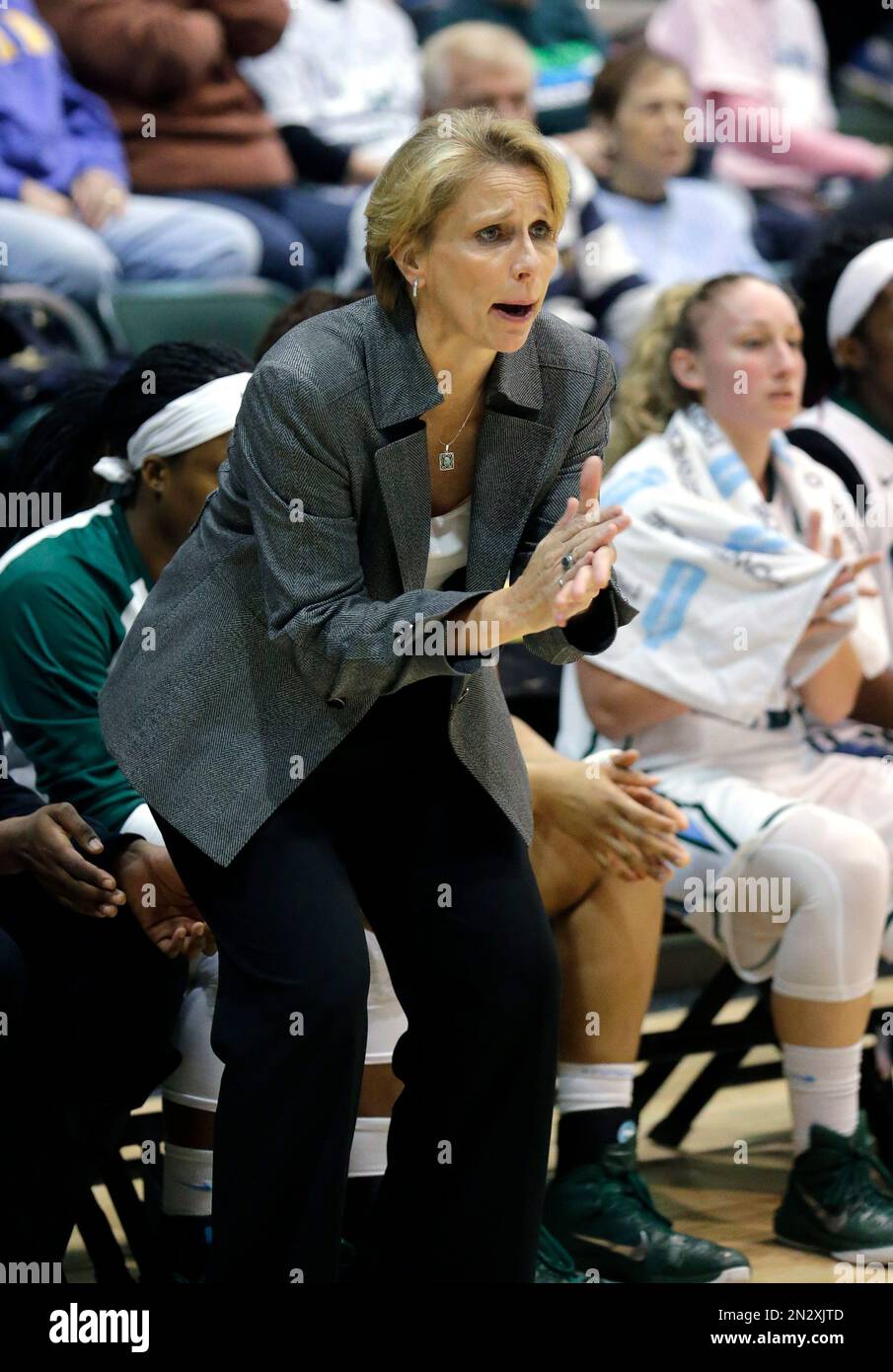 Tulane head coach Lisa Stockton cheers her team on against Connecticut ...