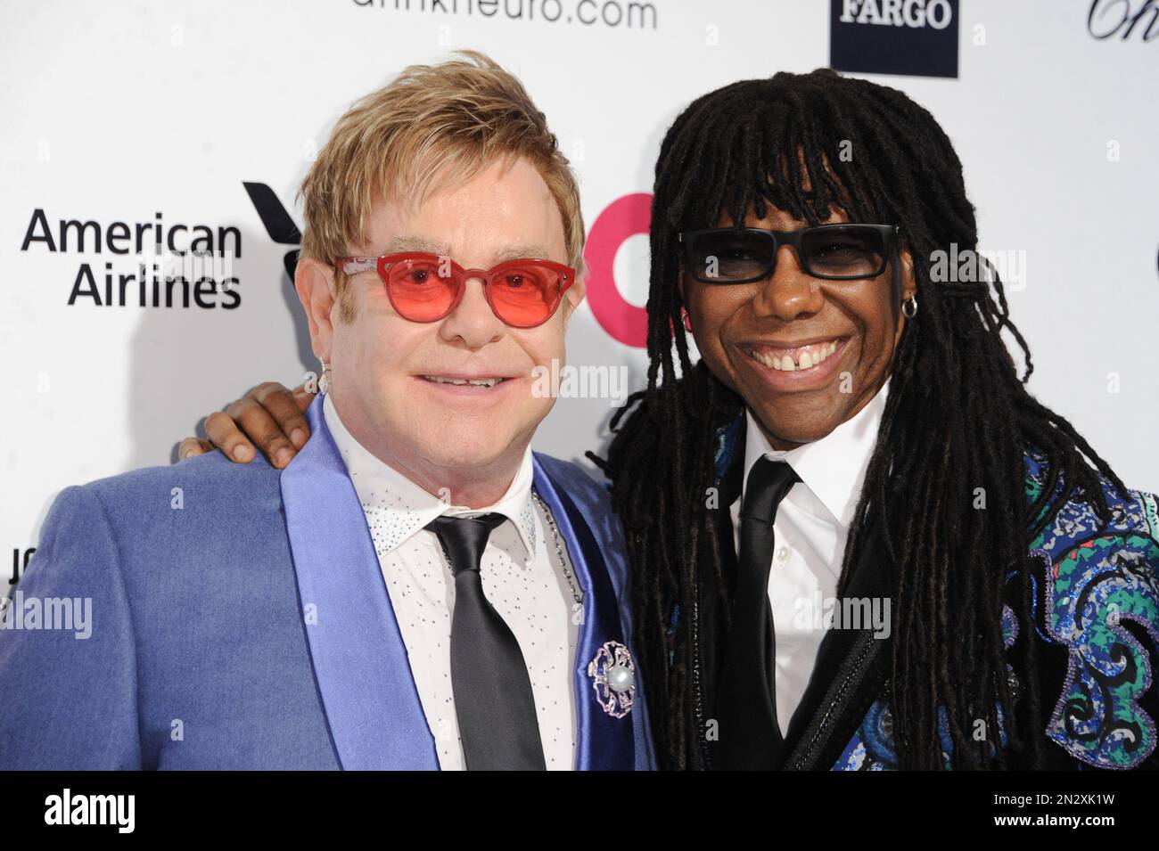 Elton John, left, and Nile Rodgers arrive at the 87th Academy Awards ...