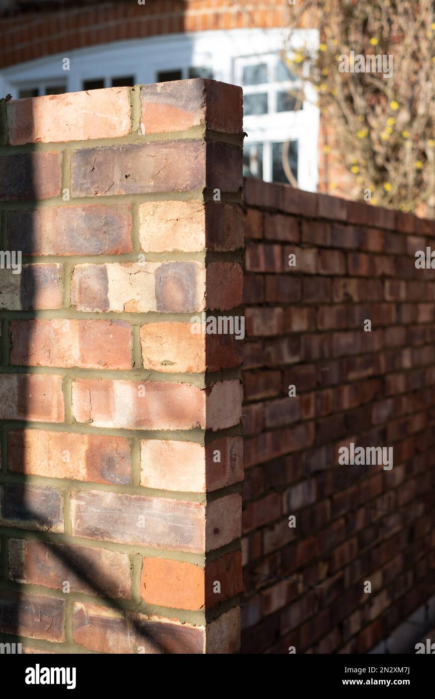 Newly built brick wall with fresh mortar, part of a renovation of an ...