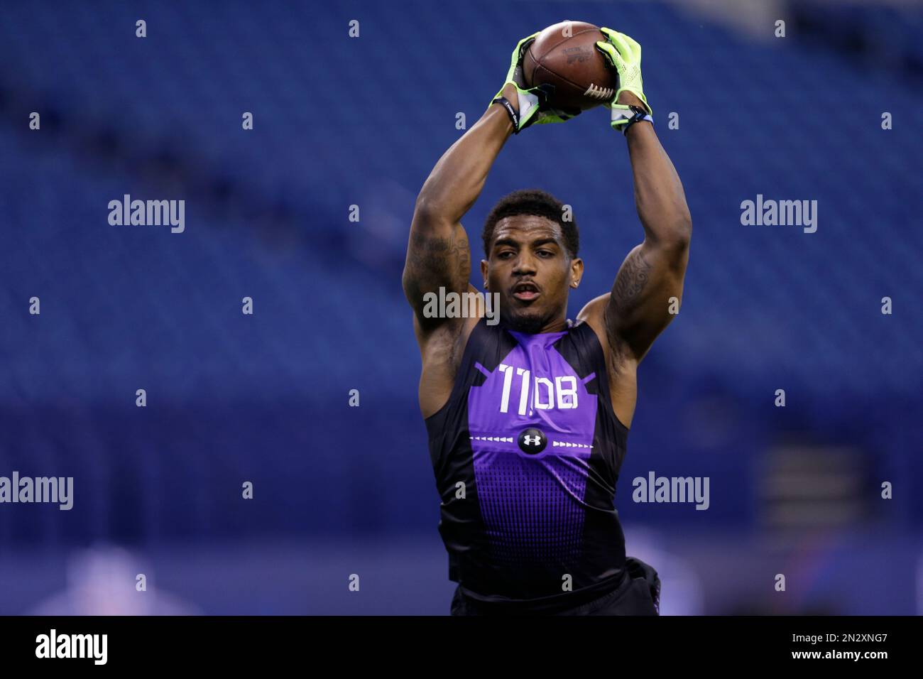 Texas defensive back Quandre Diggs runs a drill at the NFL football ...