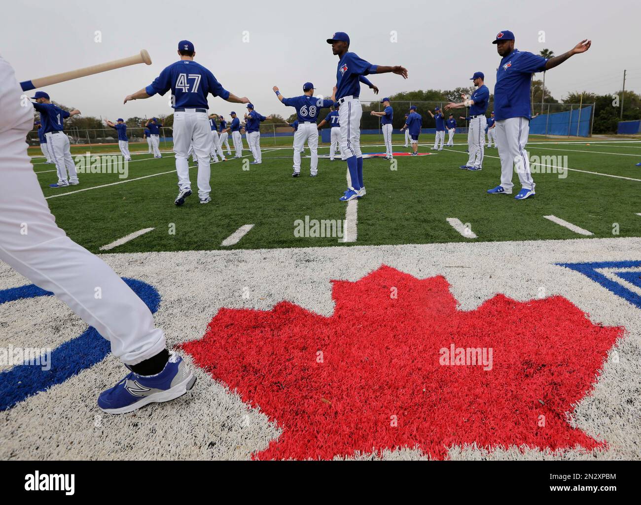 Toronto Blue Jays players do stretching exercises during the first ...