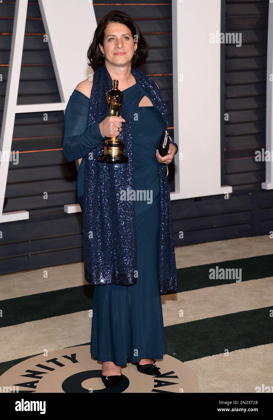 Anna Pinnock, winner of the award for best production design for "The ...