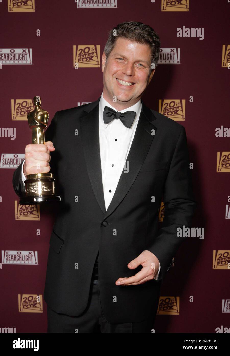 Adam Stockhausen with his award for best production design for "The ...
