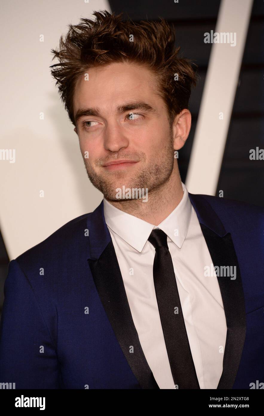Robert Pattinson arrives at the 2015 Vanity Fair Oscar Party on Sunday ...