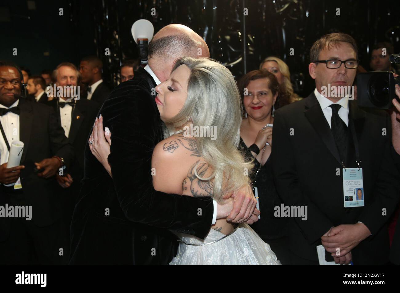 Show Producer Neil Meron, left, and Lady Gaga embrace backstage at the ...