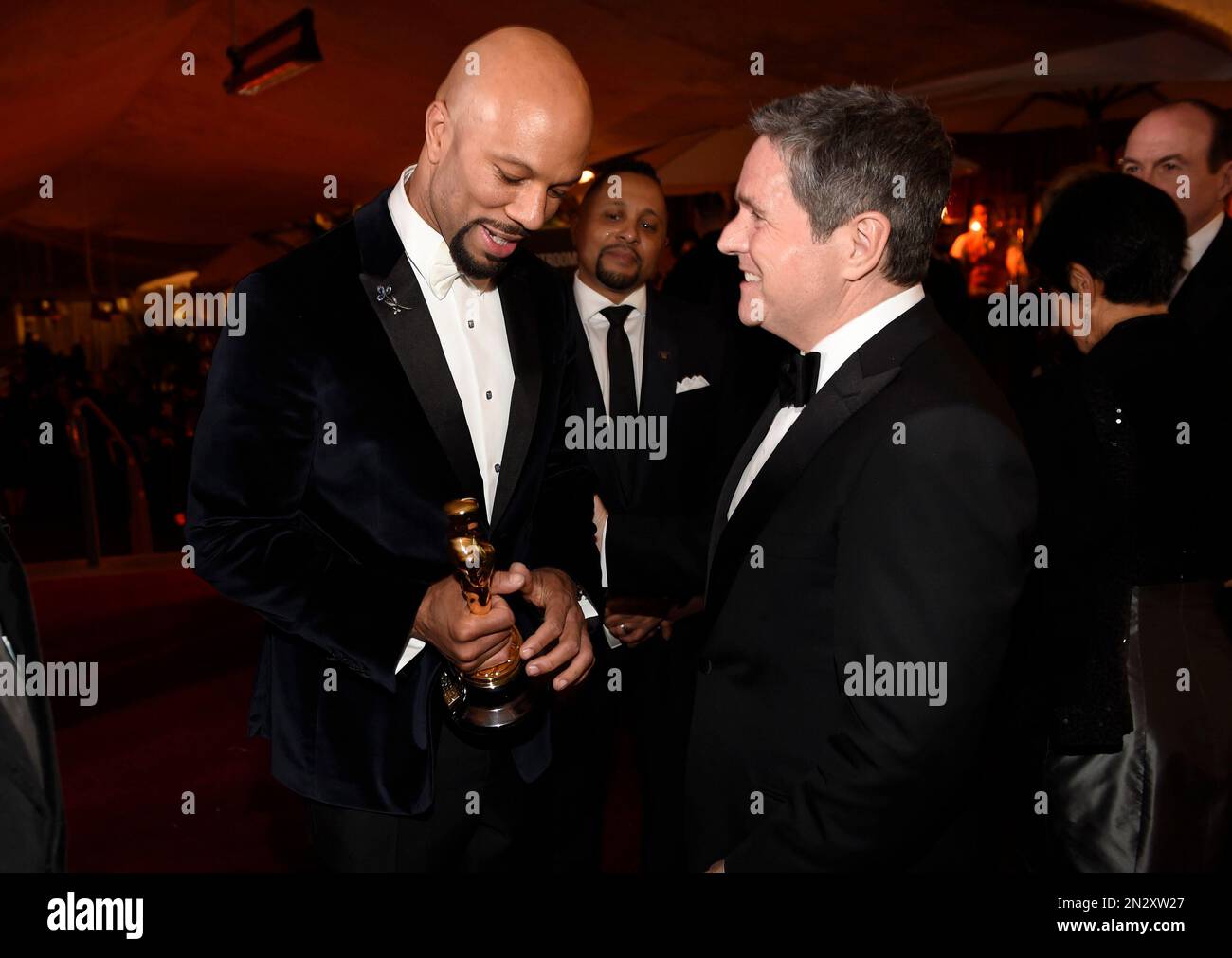 Common, left, winner of the award for best original song in a feature ...