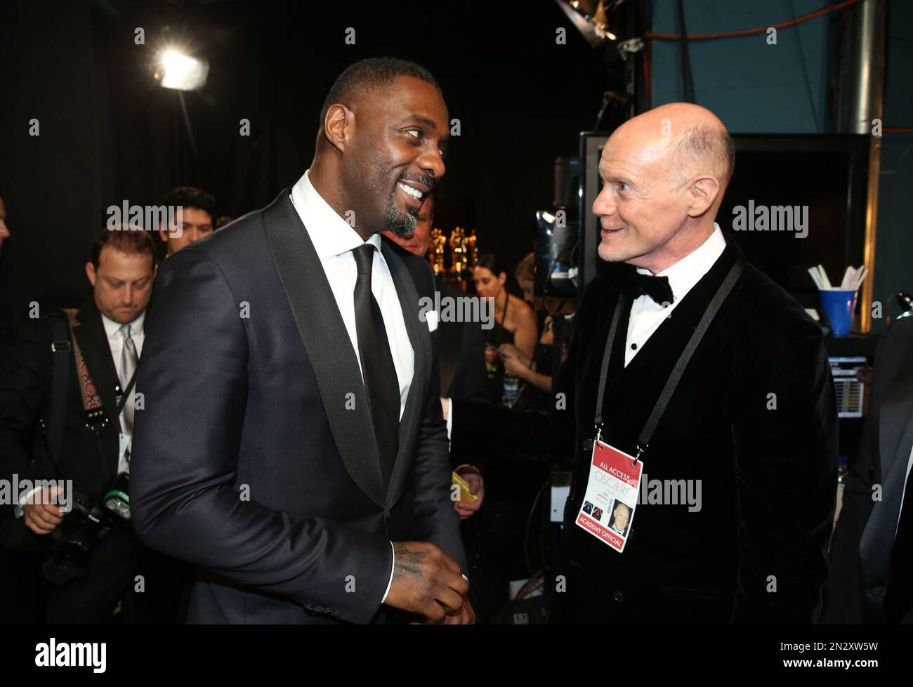 Idris Elba, left, and Show Producer Neil Meron are seen backstage at ...