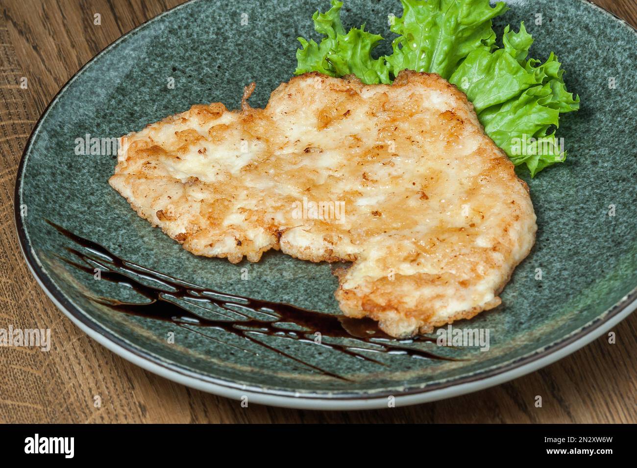 Dishes from the chef of the restaurant. A dish on a table in a cafe ...