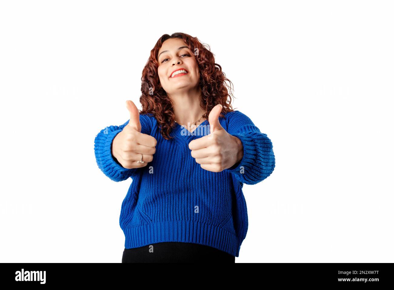 Portrait of cheerful woman standing isolated over white background ...