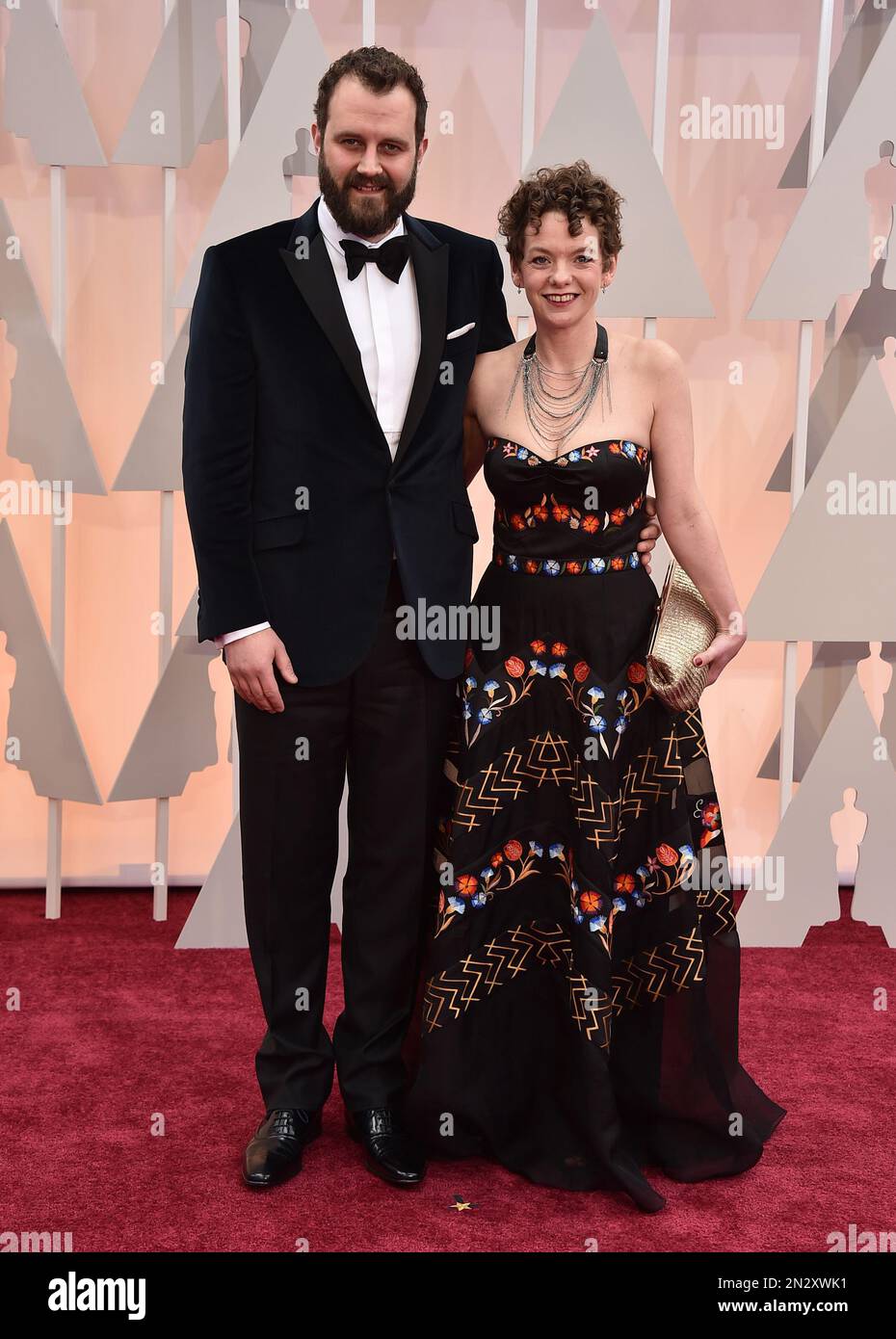 Barney Pilling, left, and guest arrive at the Oscars on Sunday, Feb. 22 ...